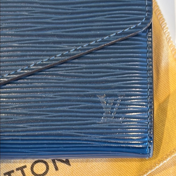 Louis Vuitton | Bags | Louis Vuitton Blue Wallet In Textured Leather ...